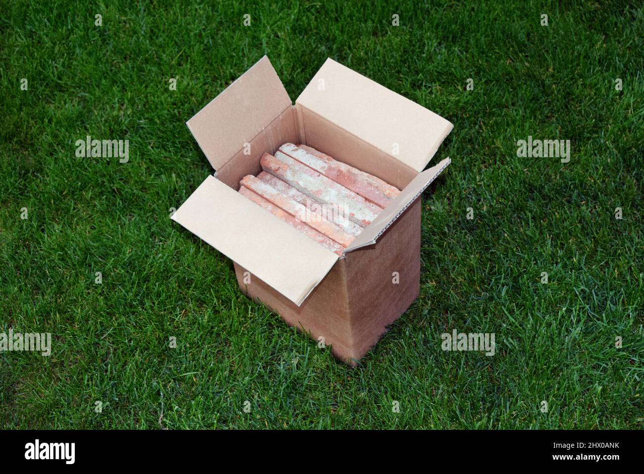 Red cardboard bricks hi-res stock photography and images - Alamy