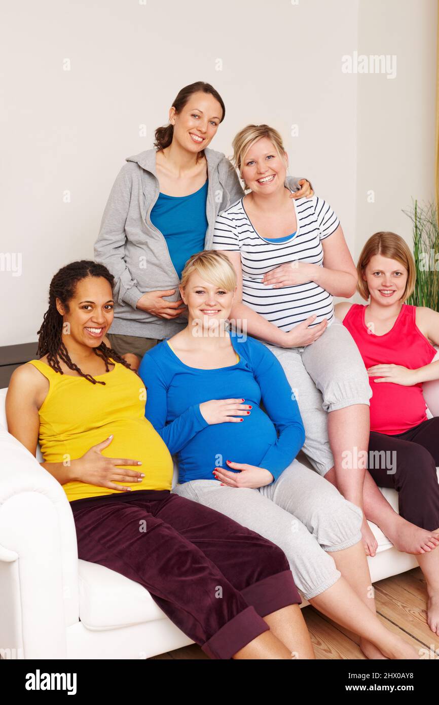 We cant wait for the big day. A group of multi-ethnic pregnant women ...