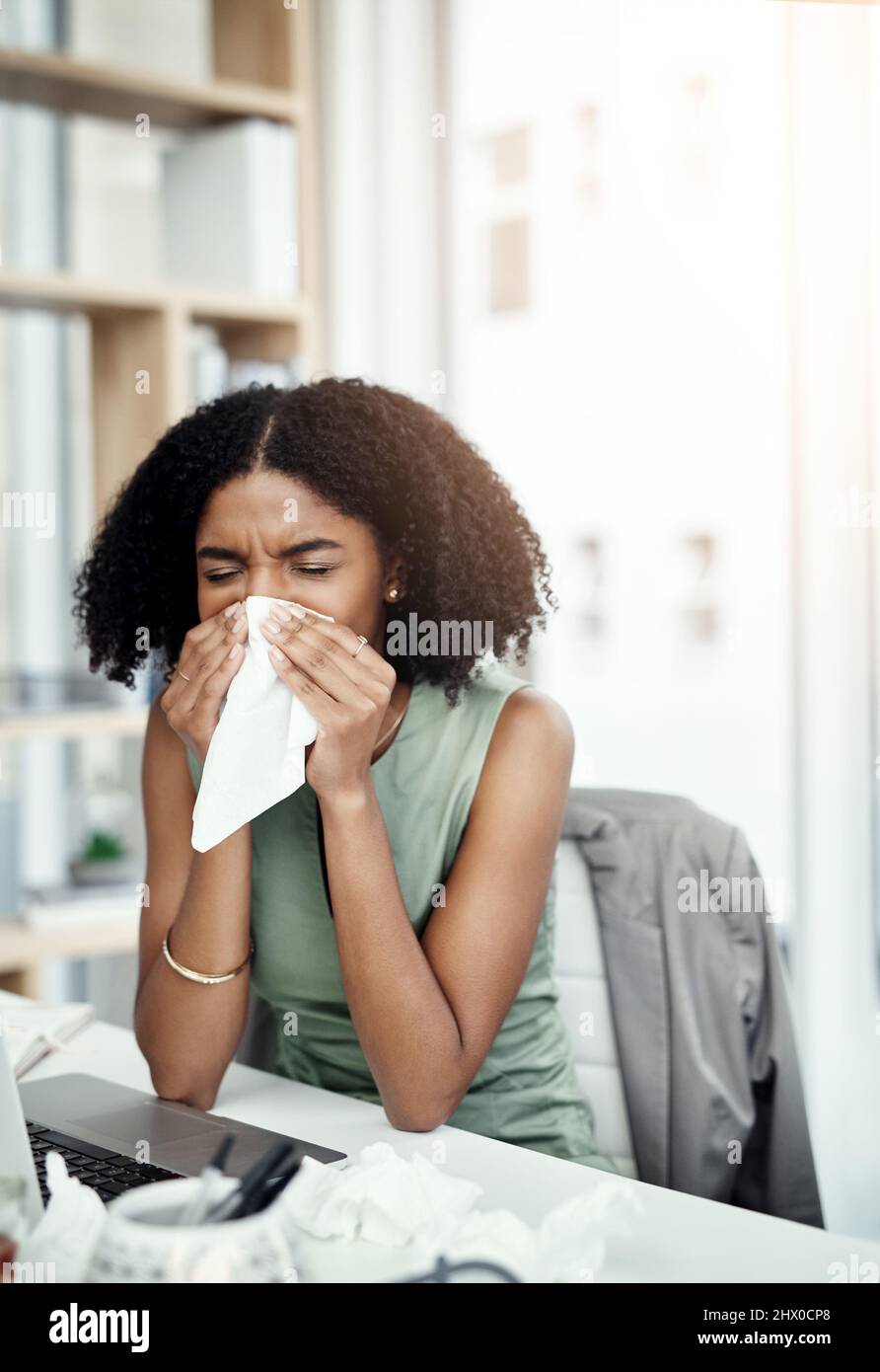 Woman sitting at desk cold hi-res stock photography and images - Alamy