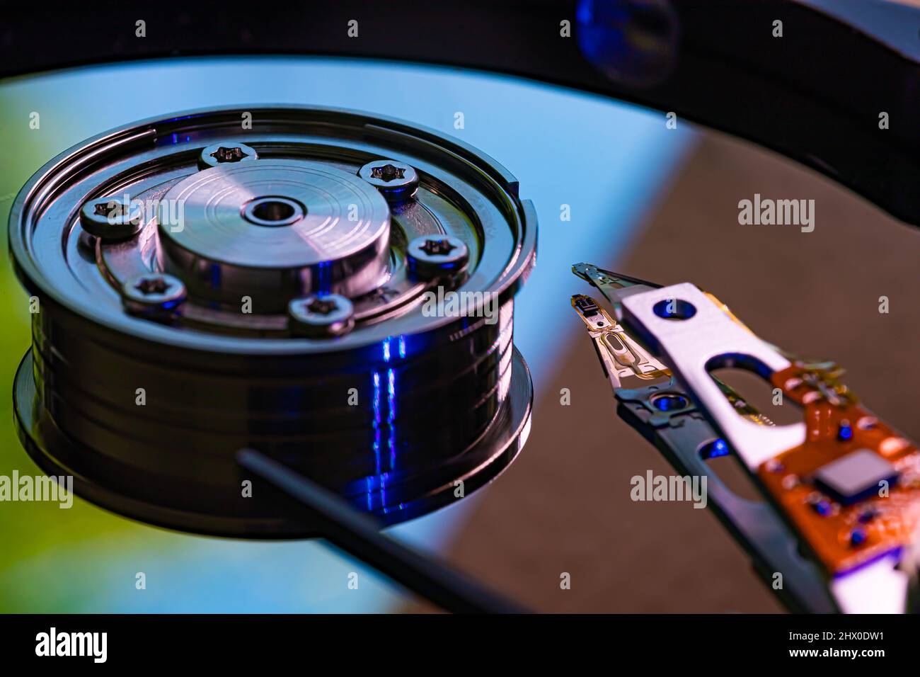 Macro Close up of inside of magnetic Hard Disc Drive with mirror ...