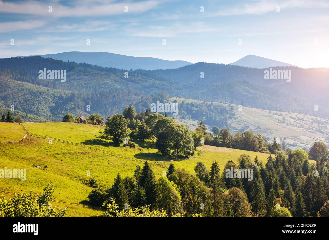 Great view of the alpine valley that glowing by sunlight. Picturesque ...