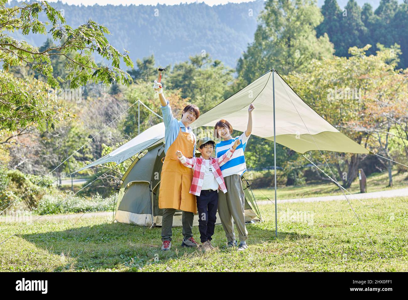 Japanese Family At Campsite Stock Photo - Alamy