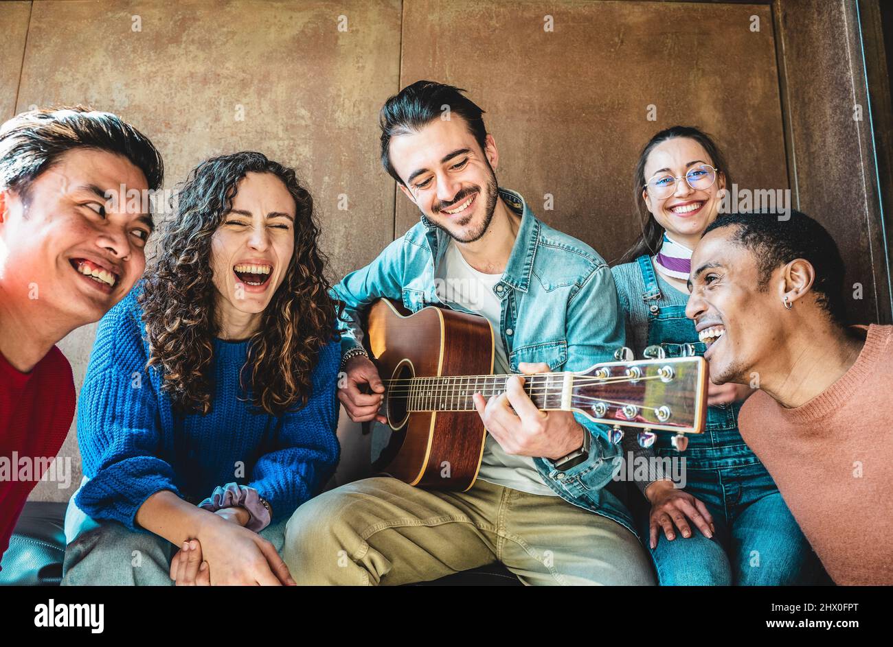 Group of trendy multi ethnic students having fun together at leisure ...