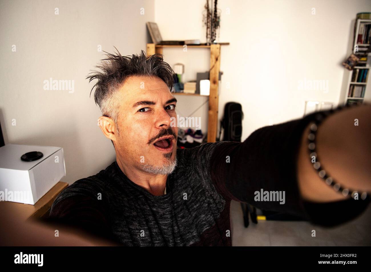 Handsome Caucasian 40 Years Old Man Taking A Selfie Portrait Indoor At