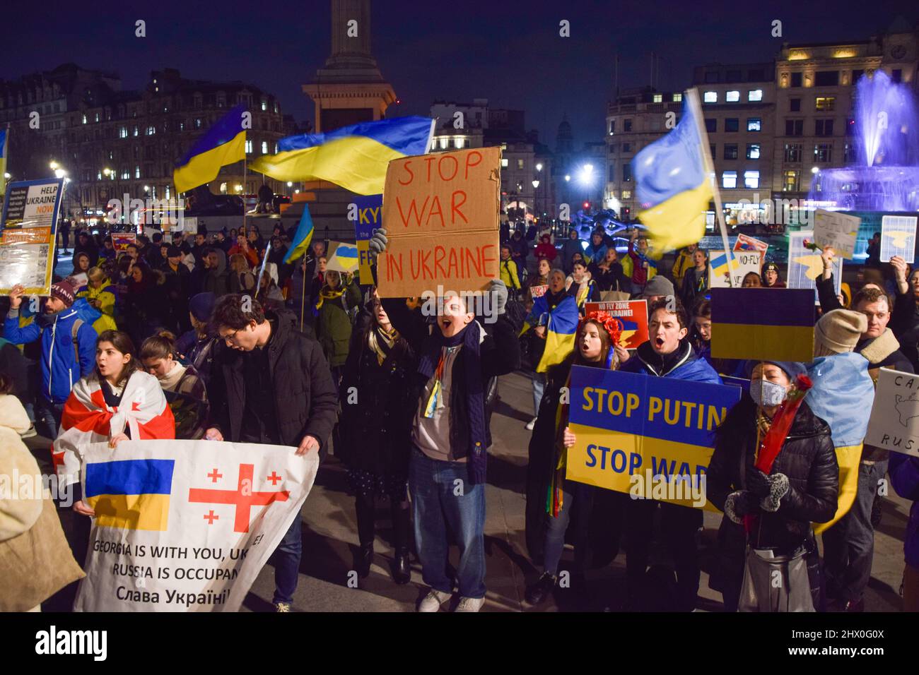 London, UK. 8th March 2022. Hundreds of people gathered in Trafalgar ...