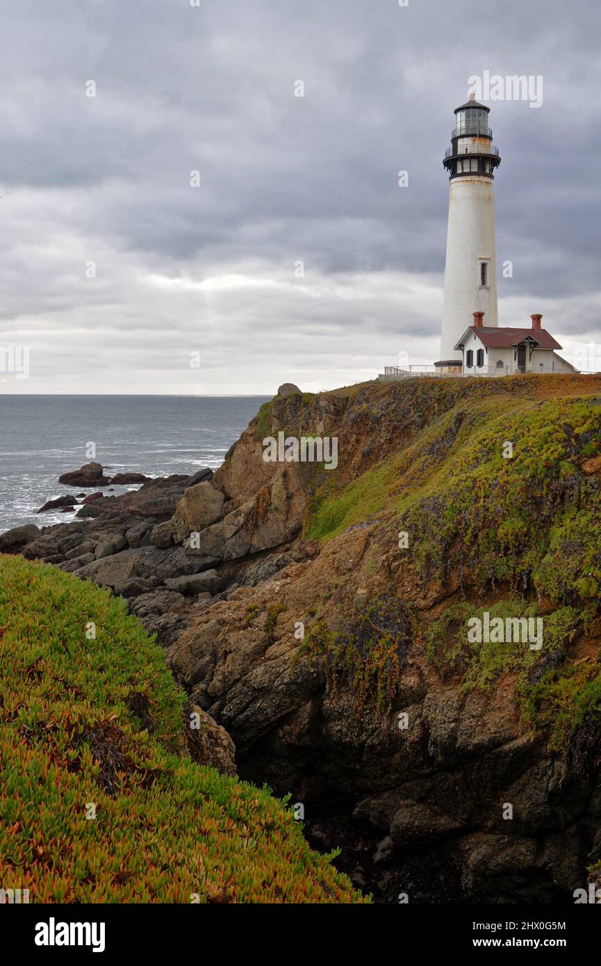 Historic 1871 Coast Guard Pigeon Point Lighthouse at cloudy sunset ...