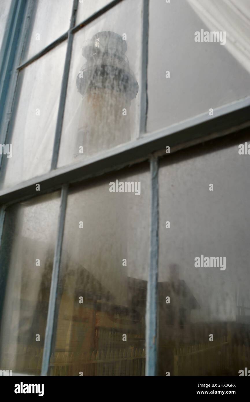 Historic 1871 Coast Guard Pigeon Point Lighthouse reflection in window ...