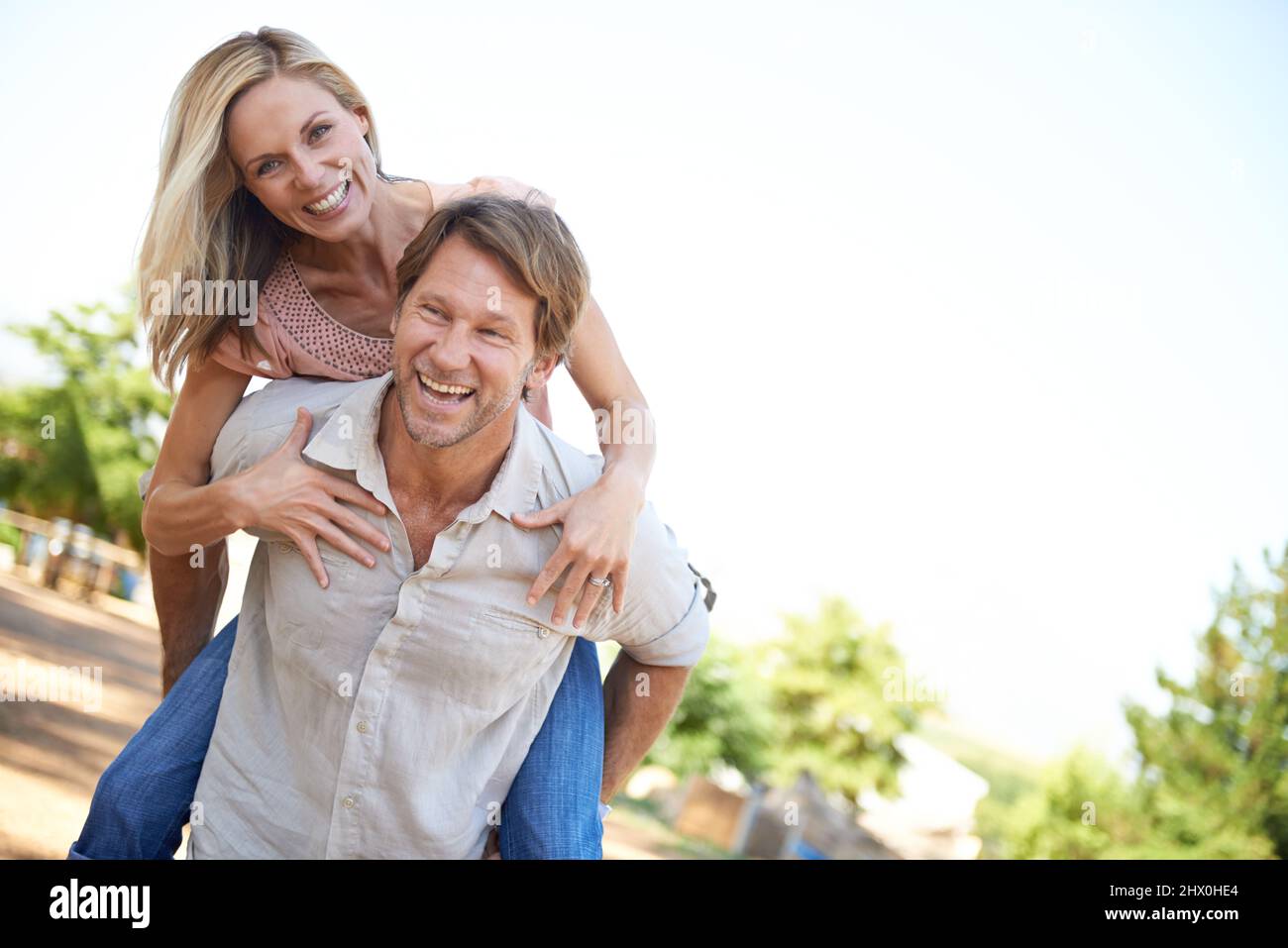 Their love is as free as nature. Shot of a happy mature enjoying a ...