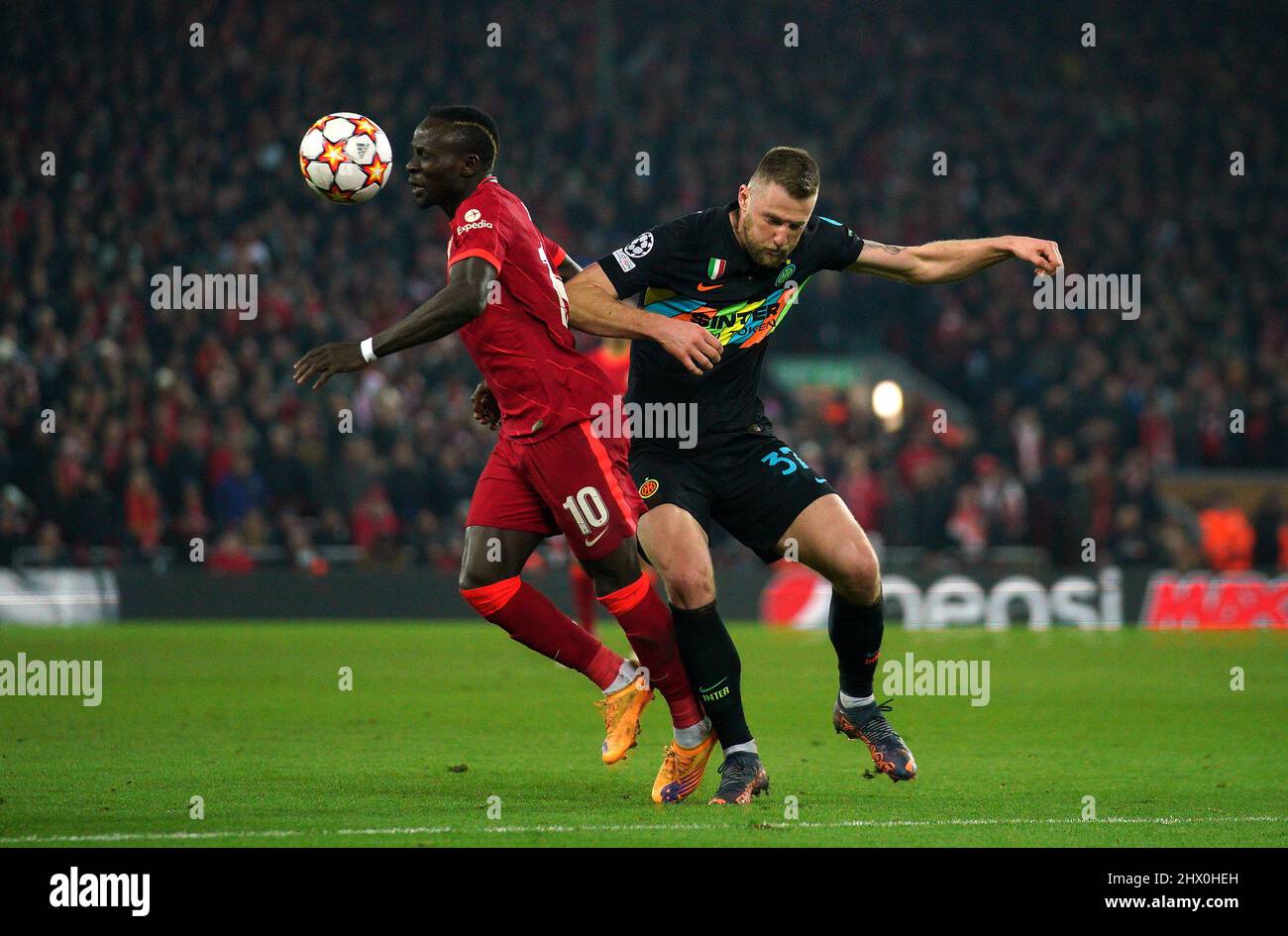 Liverpool's Sadio Mane (left) and Inter Milan's Milan Skriniar battle ...