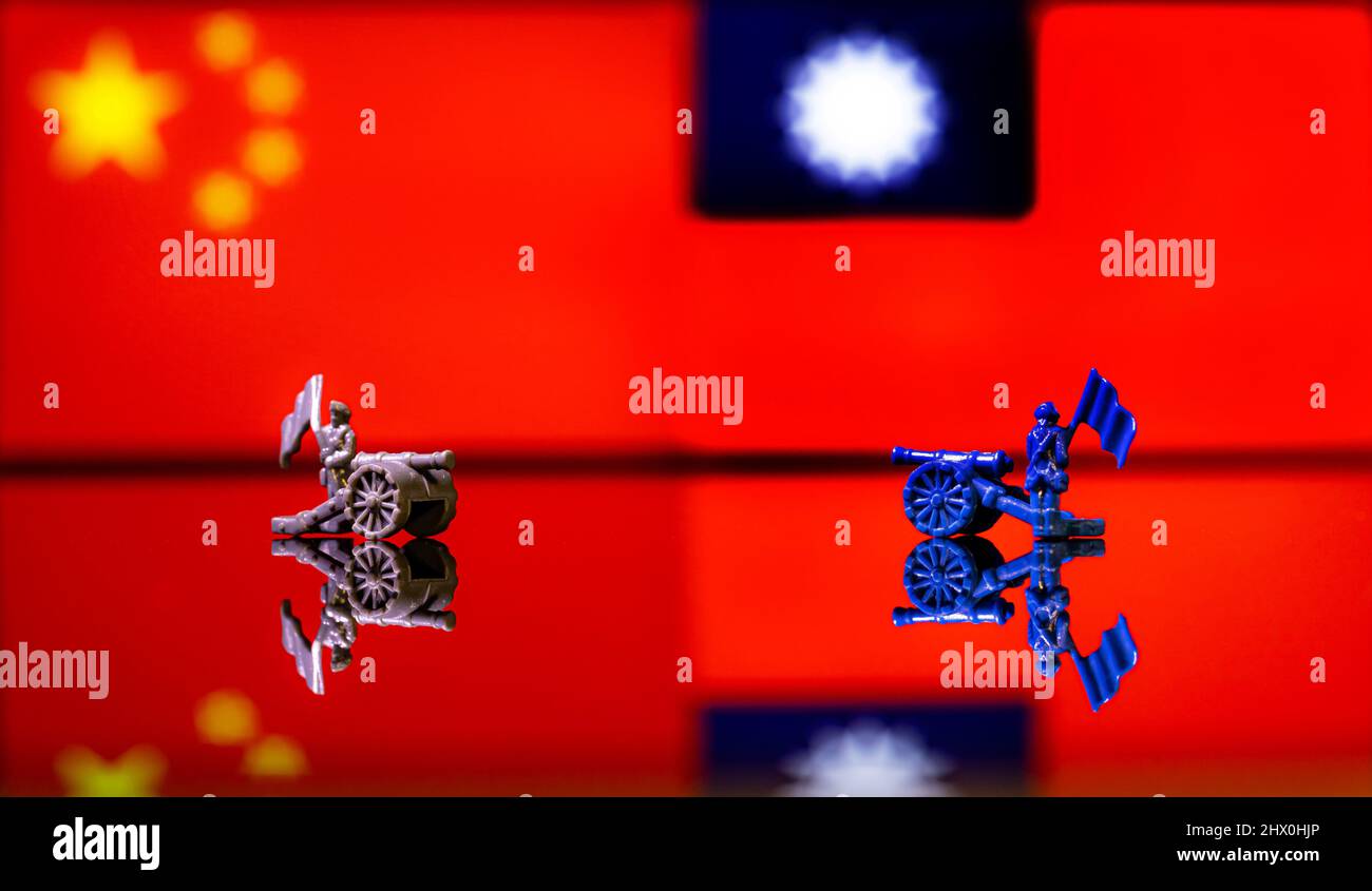 Conceptual image of war between China and Taiwan using toy soldiers and ... Conceptual image of war between China and Taiwan using toy soldiers and ...