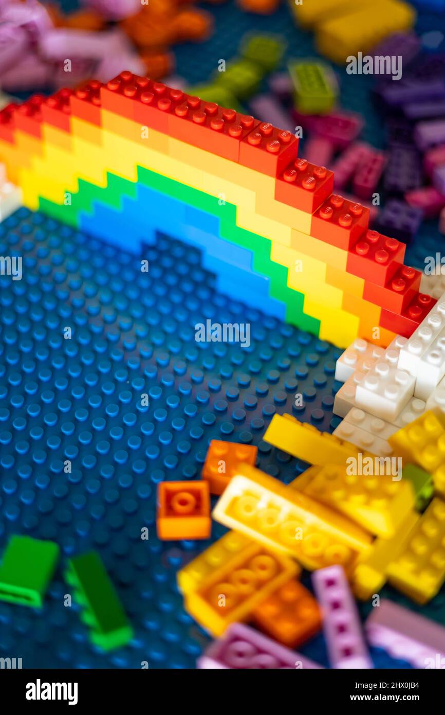 Khabarovsk, Russia, February 25, 2022. Multicolored rainbow creating from Lego Classic small ...