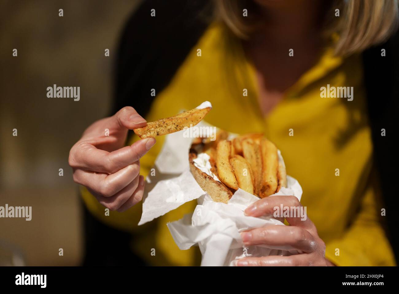 Woman eats fast food hi-res stock photography and images - Alamy