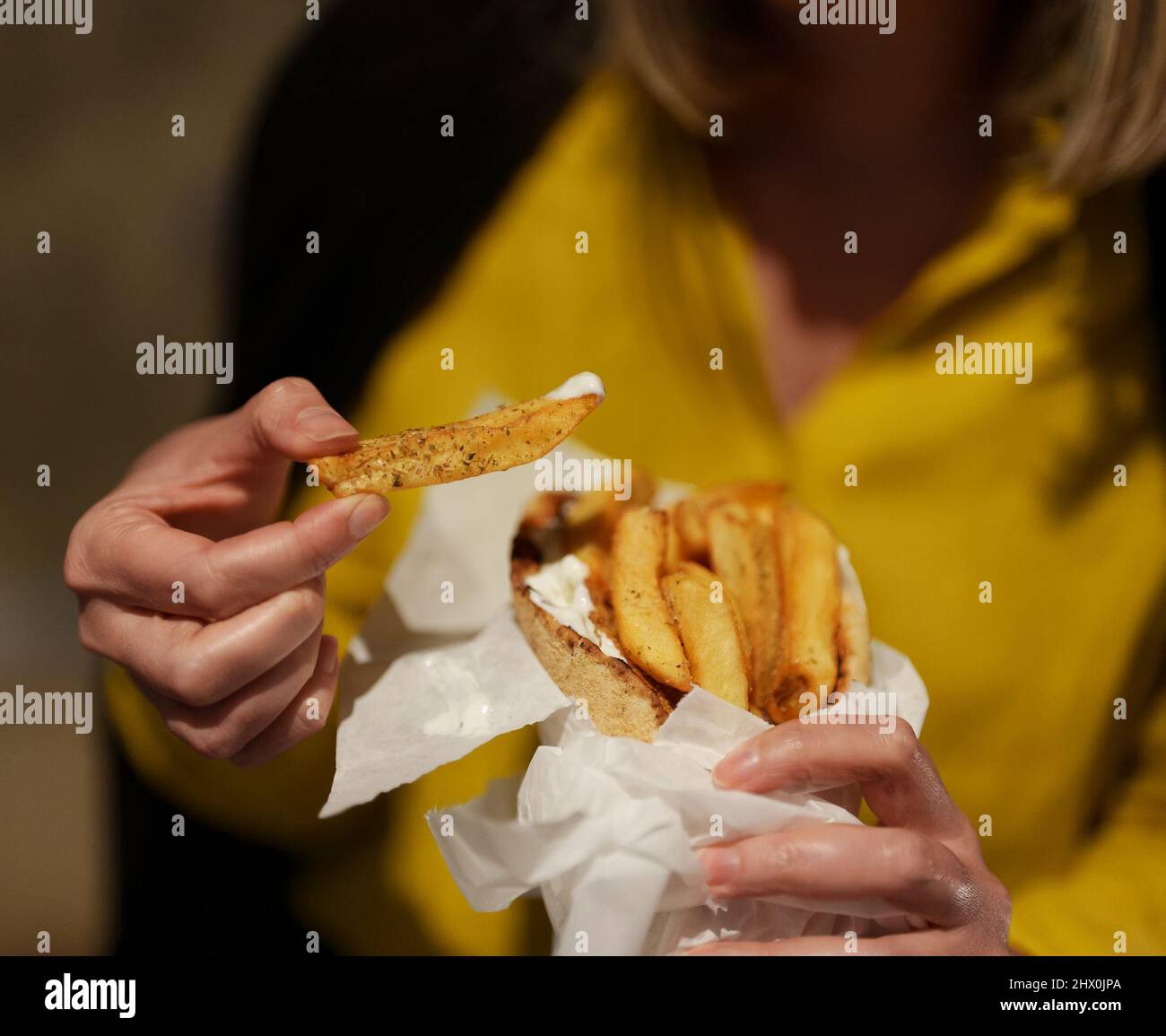 Woman eats fast food hi-res stock photography and images - Alamy