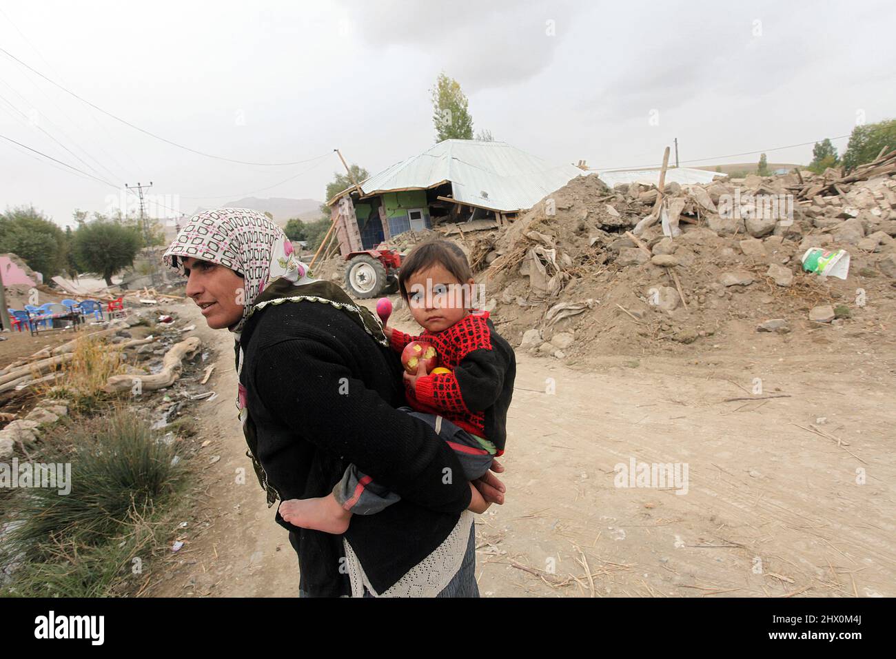 VAN, TURKEY - OCTOBER 25: Earthquake victims mom and daughter in front ...