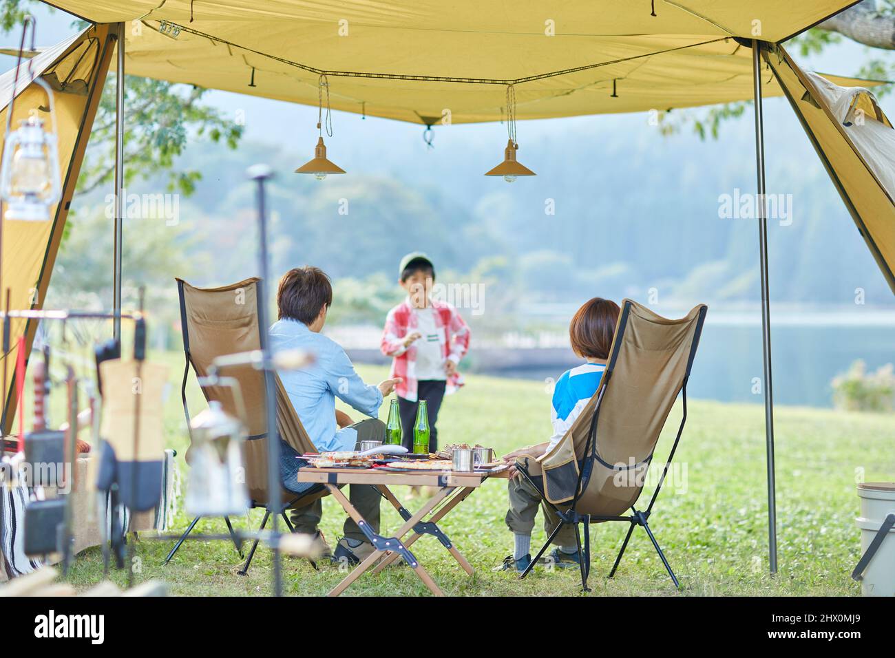 Japanese Family At Campsite Stock Photo - Alamy