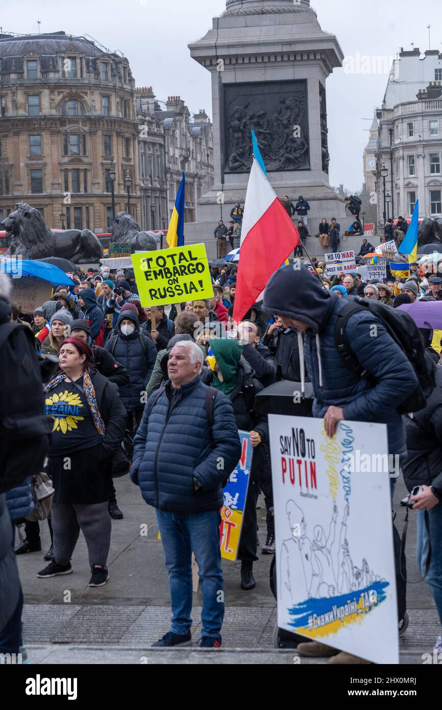 Protesters have once again gathered in Trafalgar Square with placards ...