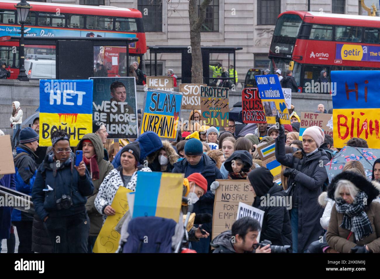 Protesters have once again gathered in Trafalgar Square with placards ...