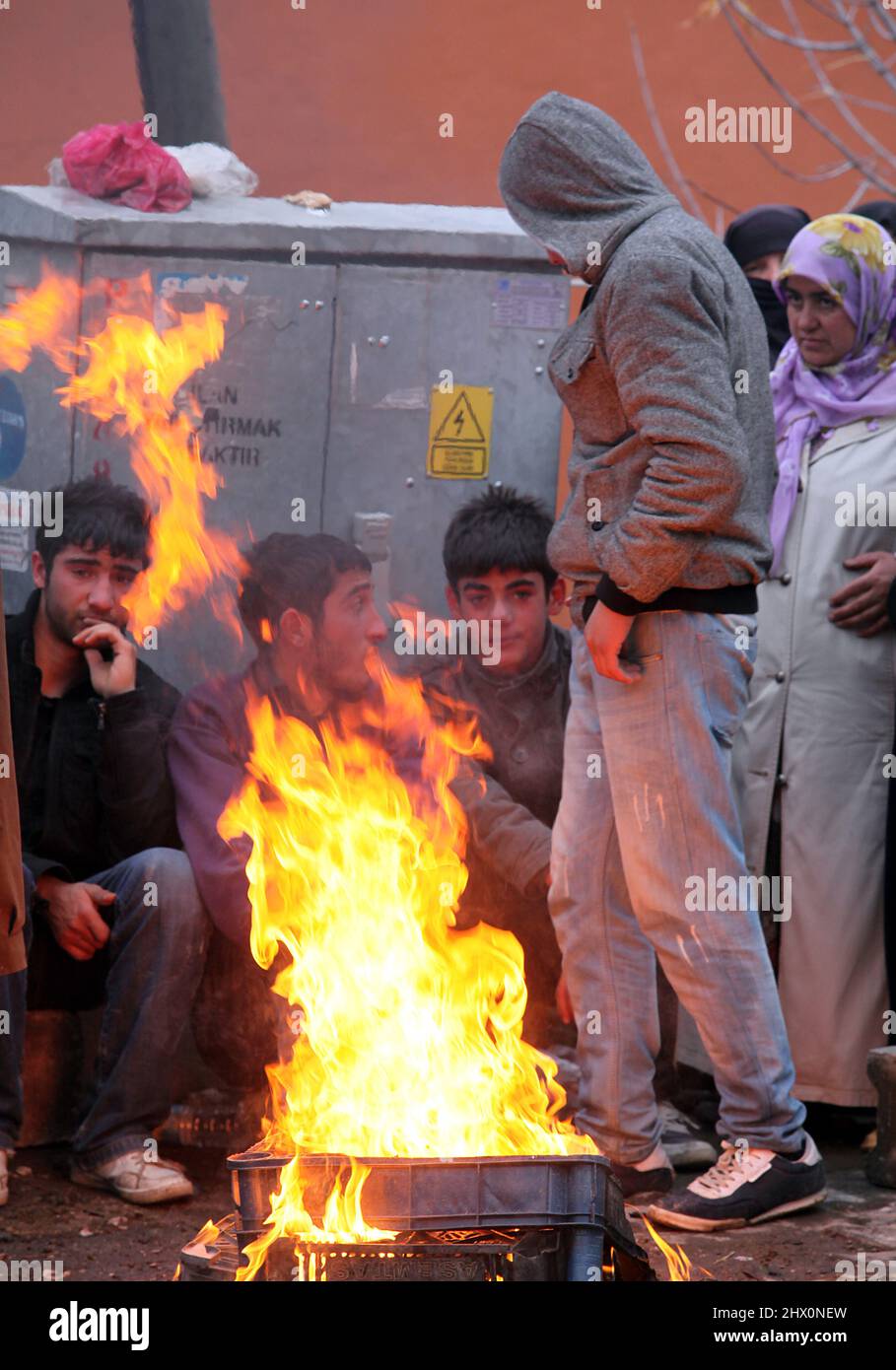 VAN, TURKEY - OCTOBER 25: Earthquake victims sitting around a campfire ...