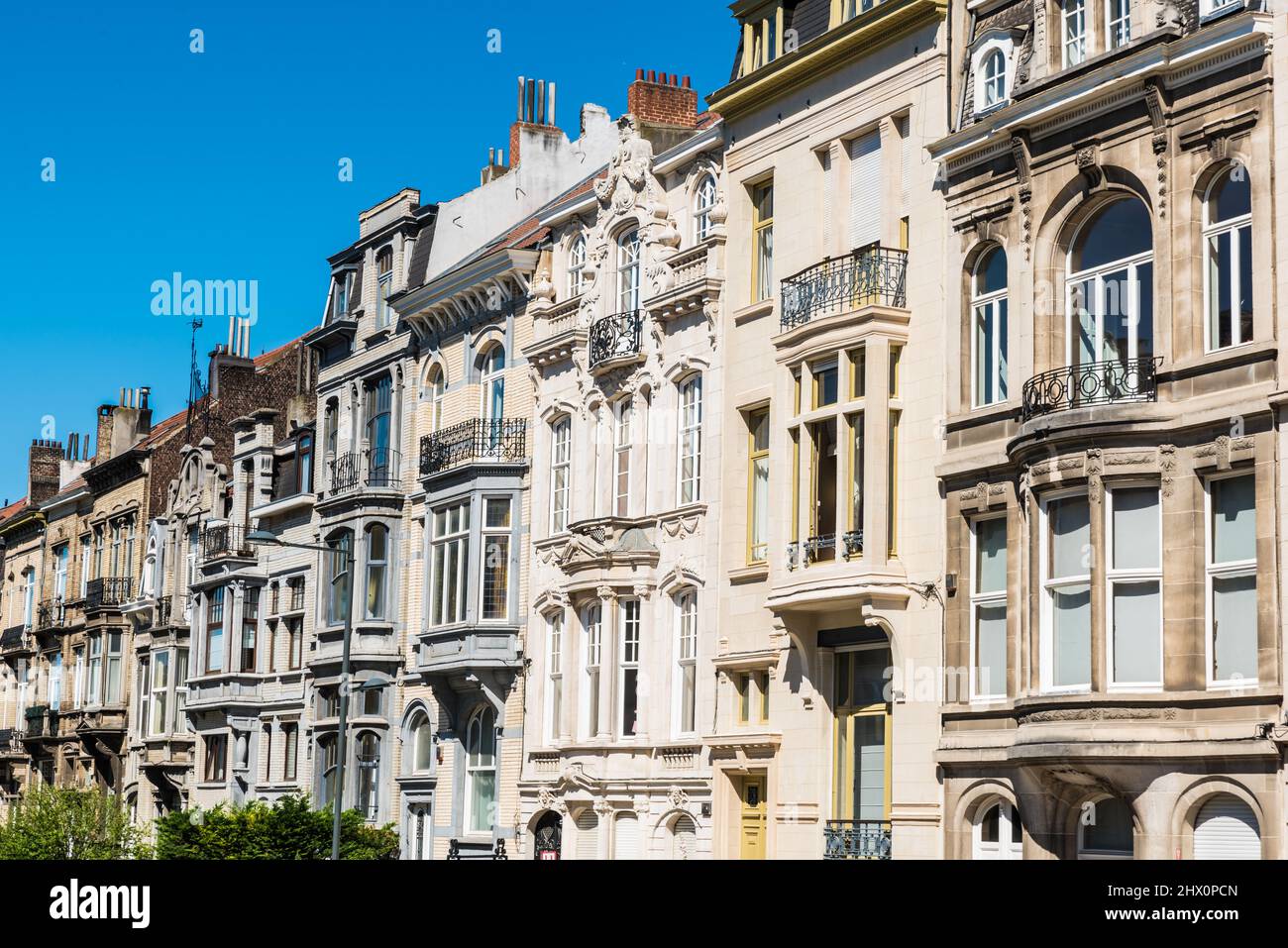Schaerbeek, Brussels, Belgium - 06 29 2019 - Facades of typical upper ...