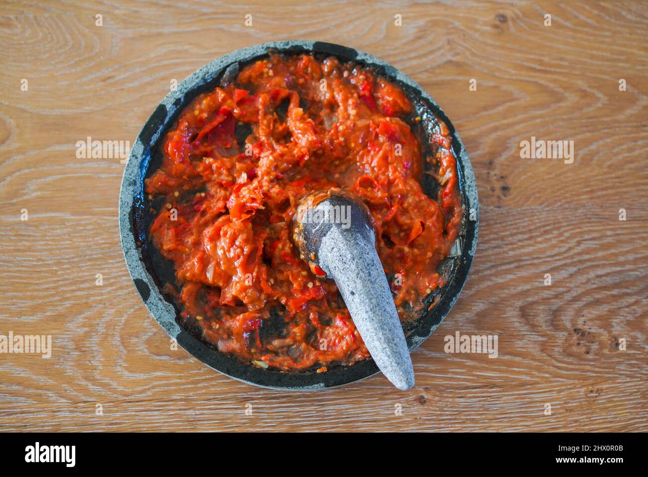 Sambal Ulek. A popular Indonesian condiment of fresh red chili peppers ...