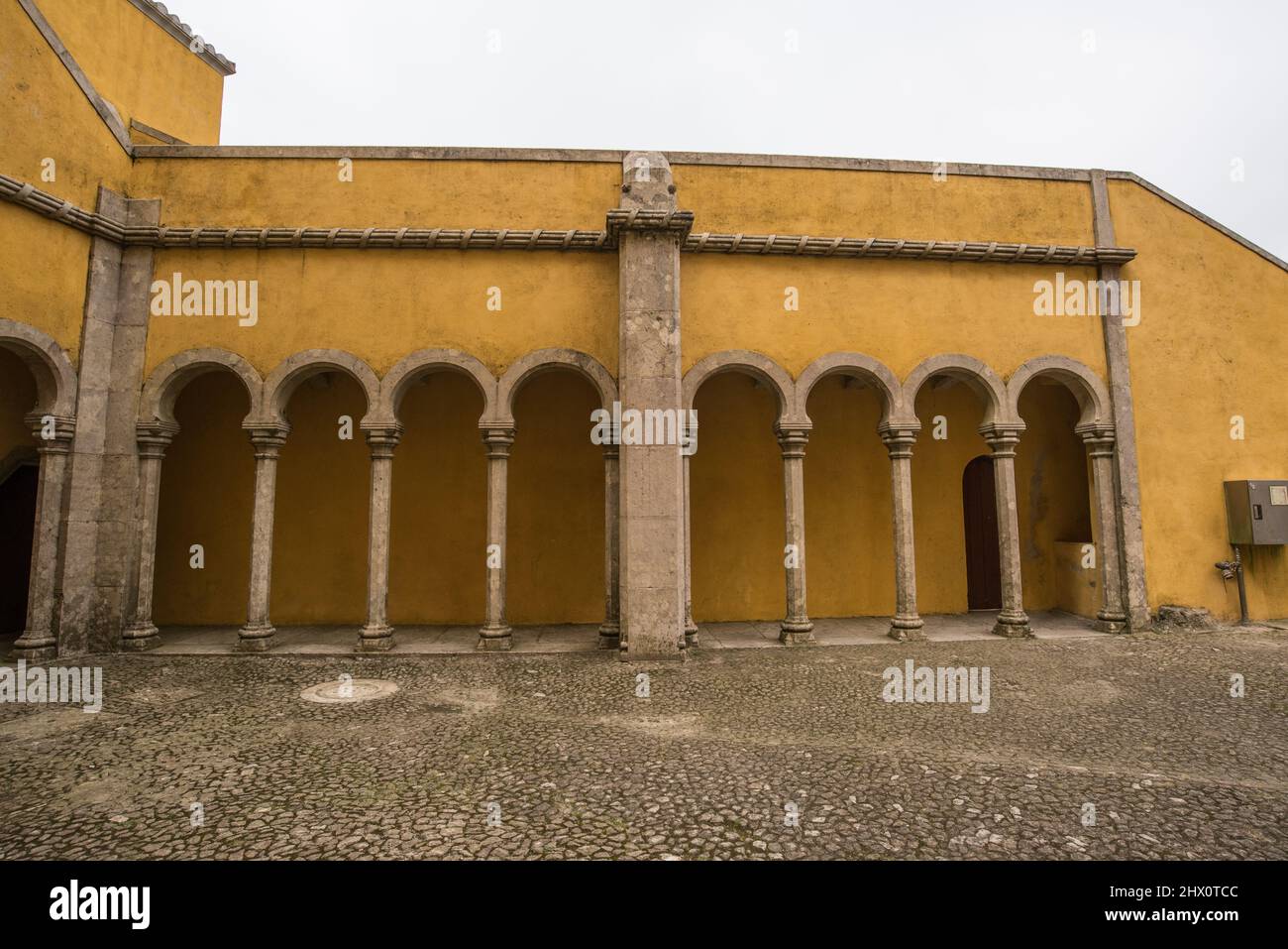 Yellow Wall with arches Stock Photo - Alamy