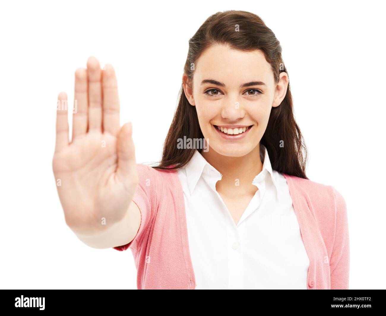 Its time to stop and take a moment. Young woman showing a stop hand ...