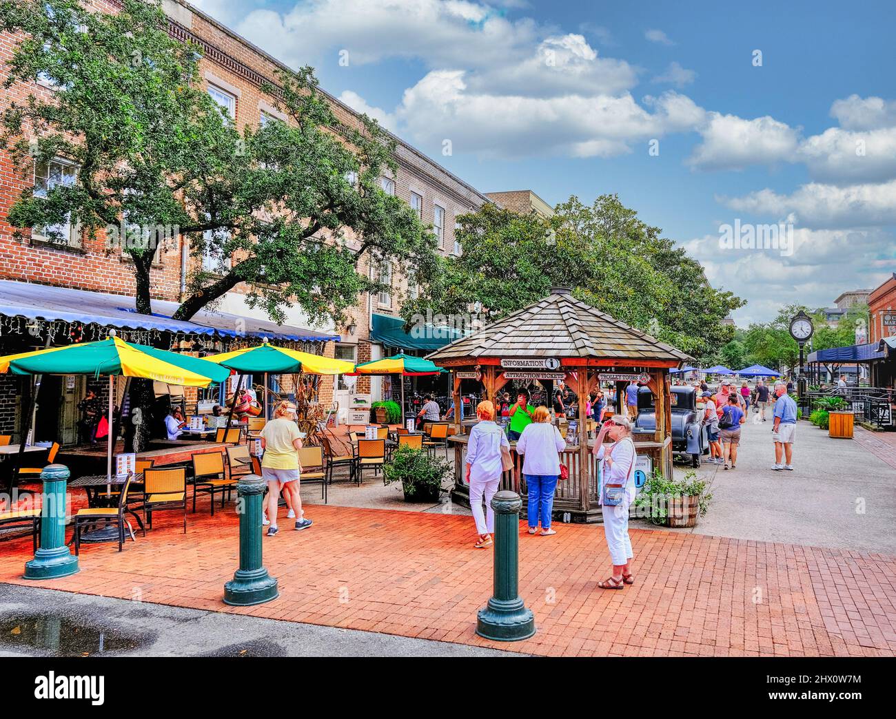 Tourists at City Market Information Booth Stock Photo - Alamy