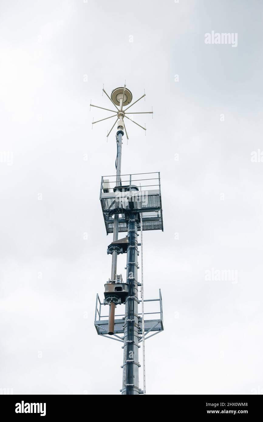 Low angle view of tall military antenna aerial for short and long ...