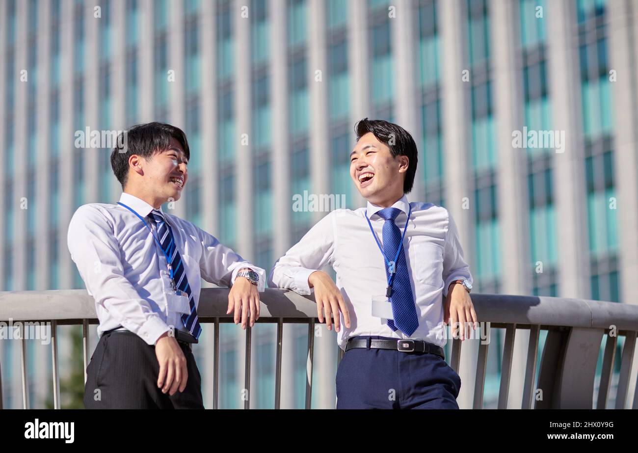 Japanese Businessmen Chatting Stock Photo - Alamy