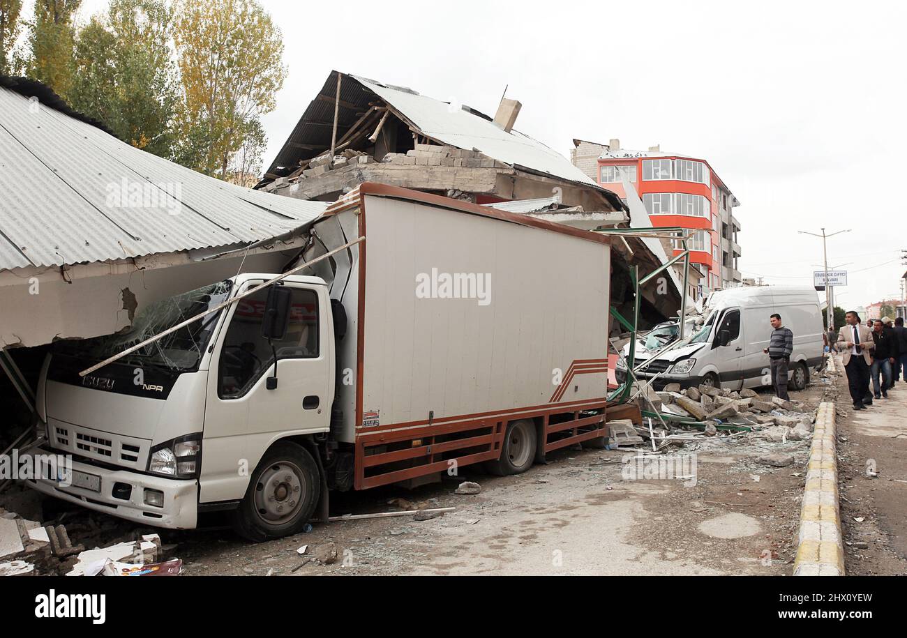 The car that was under the rubble after the earthquake in Van, Turkey ...