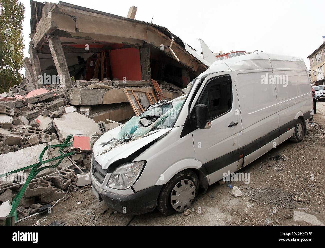 The car that was under the rubble after the earthquake in Van, Turkey ...