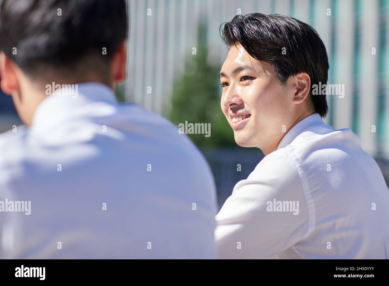 Japanese Businessmen Chatting Stock Photo - Alamy