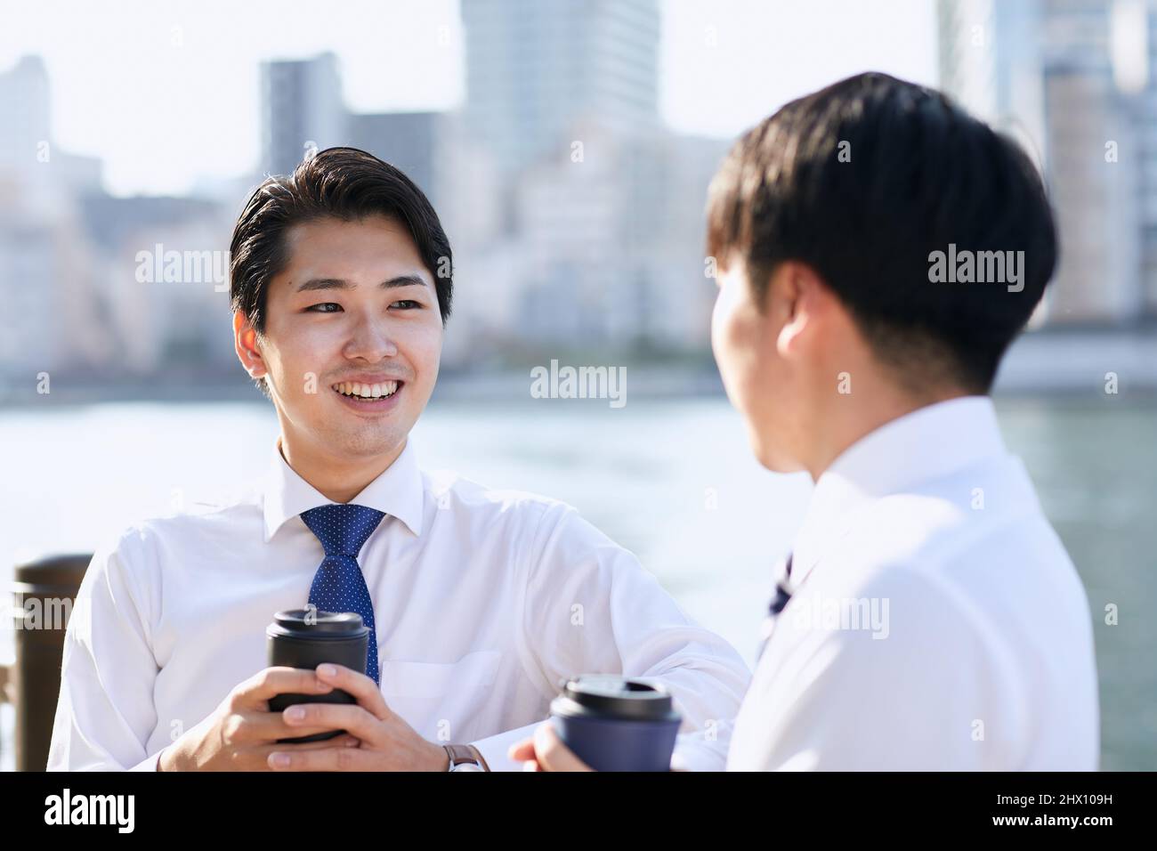 Japanese Businessmen Chatting Stock Photo - Alamy