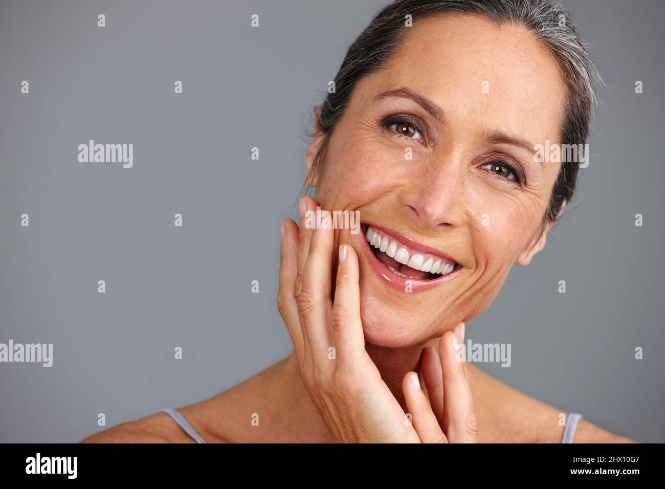 Her beauty is still as radiant as ever. Studio portrait of a beautiful ...