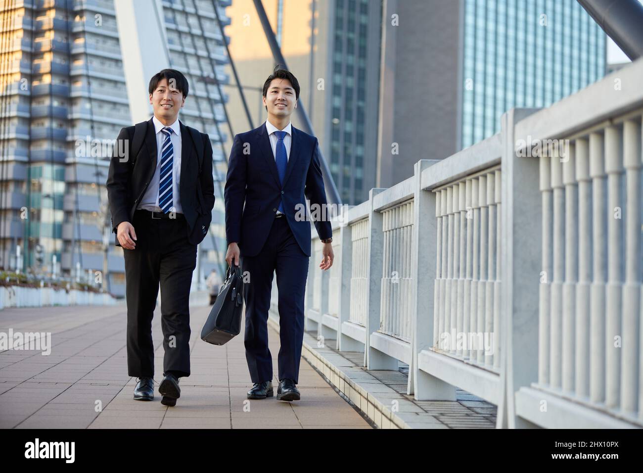 Japanese Businessmen Walking Stock Photo - Alamy