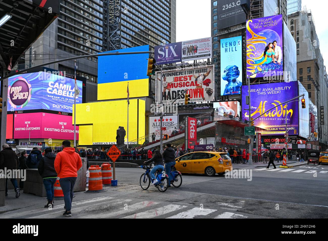 People walk past the TKTS Booth at Father Duffy Square in Times Square ...