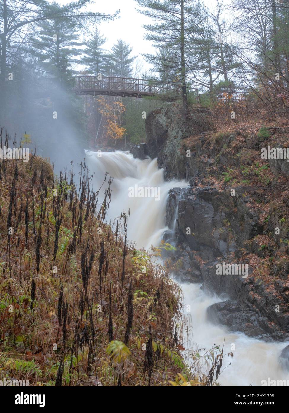 A powerful waterfall in beautiful autumn colors Stock Photo - Alamy