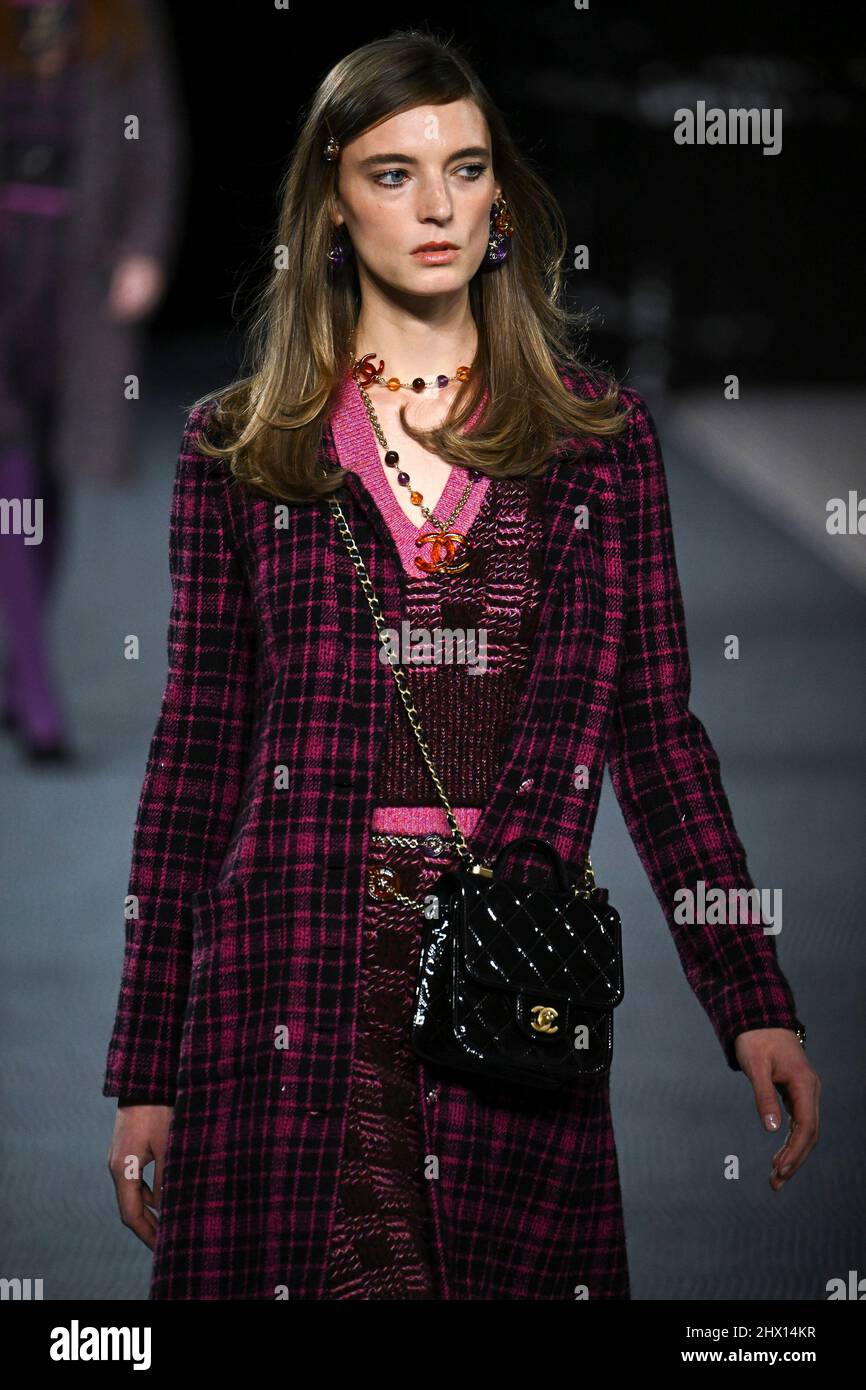 Model Ansley Gulielmi walks on the runway at the Chanel fashion show ...