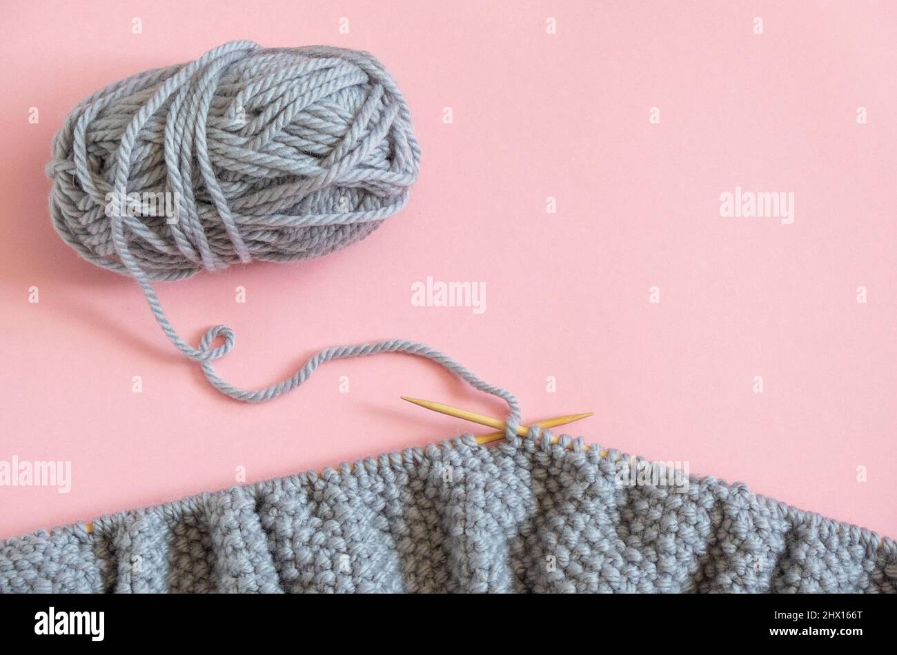 Grey knitted fabric hi-res stock photography and images - Alamy