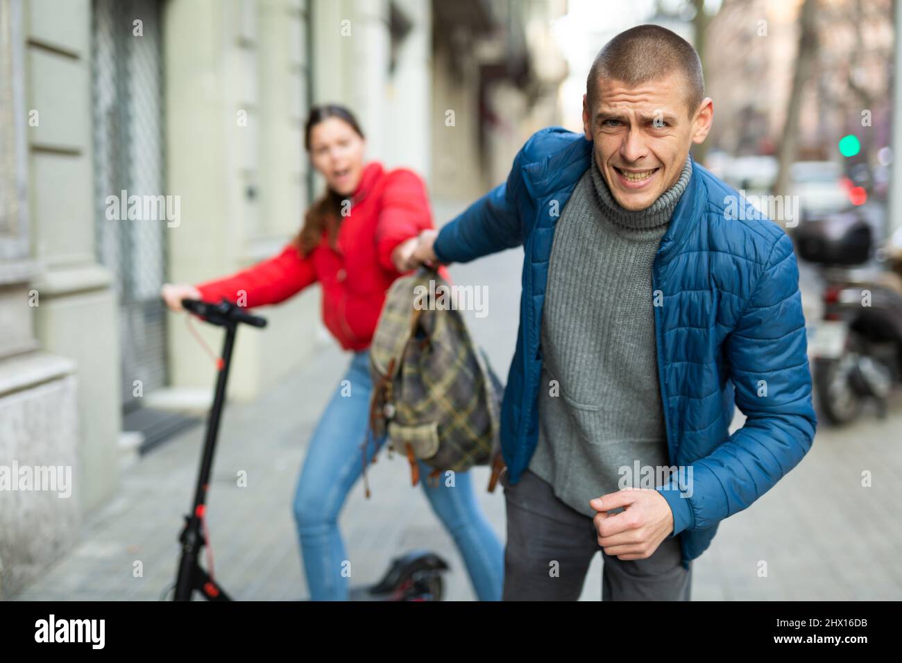 Man grabbing handbag hi-res stock photography and images - Alamy