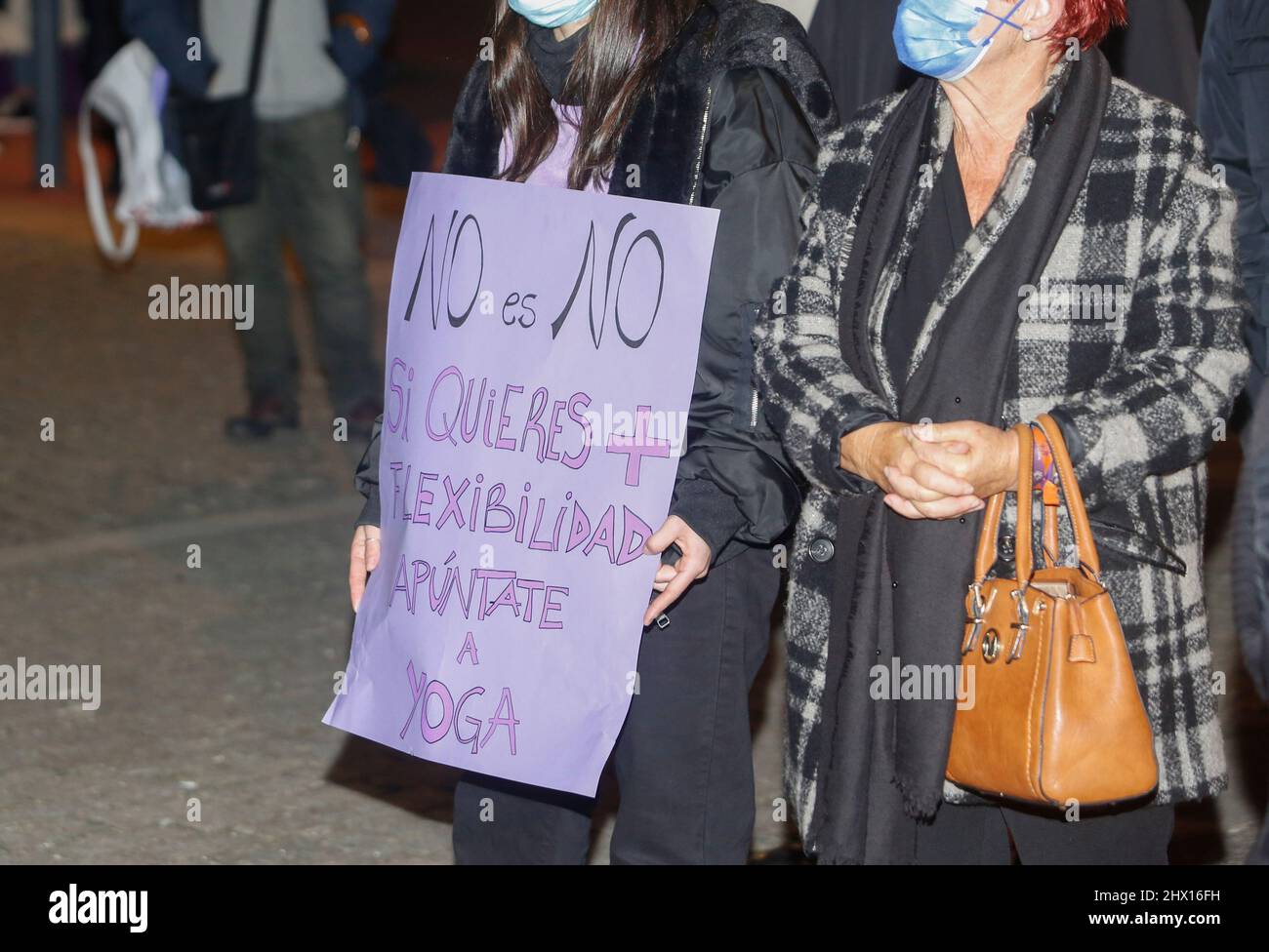 A Coruna ,Spain - March 8, 2022: Women march wearing banners and ...