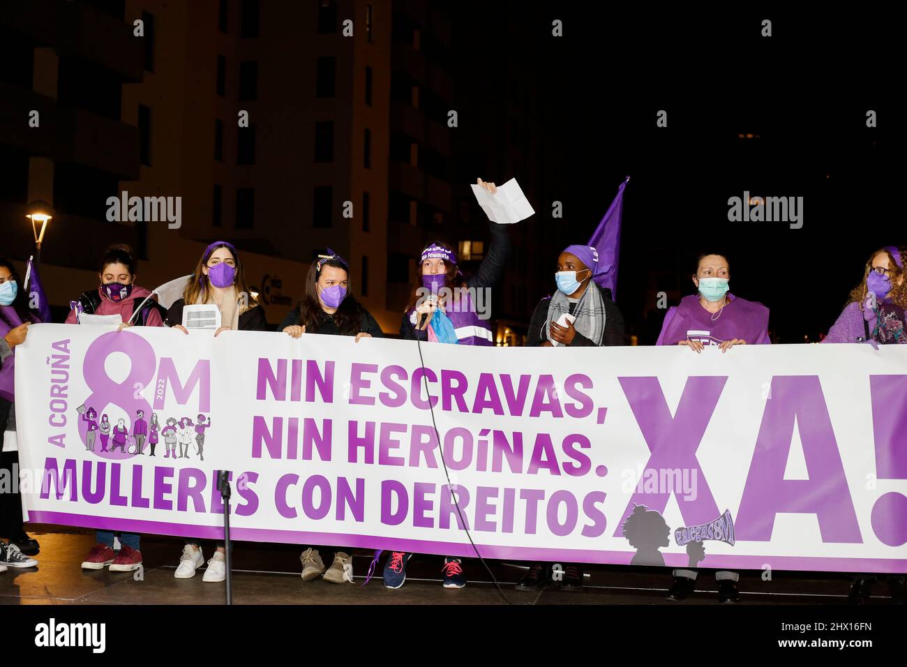A Coruna ,Spain - March 8, 2022: Women march wearing banners and ...