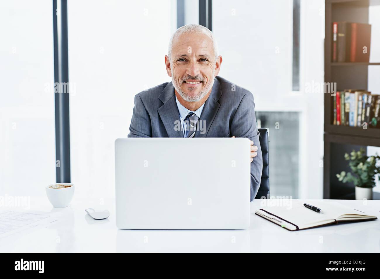 Technology keeps moving forward and so do I. Shot of a businessman ...