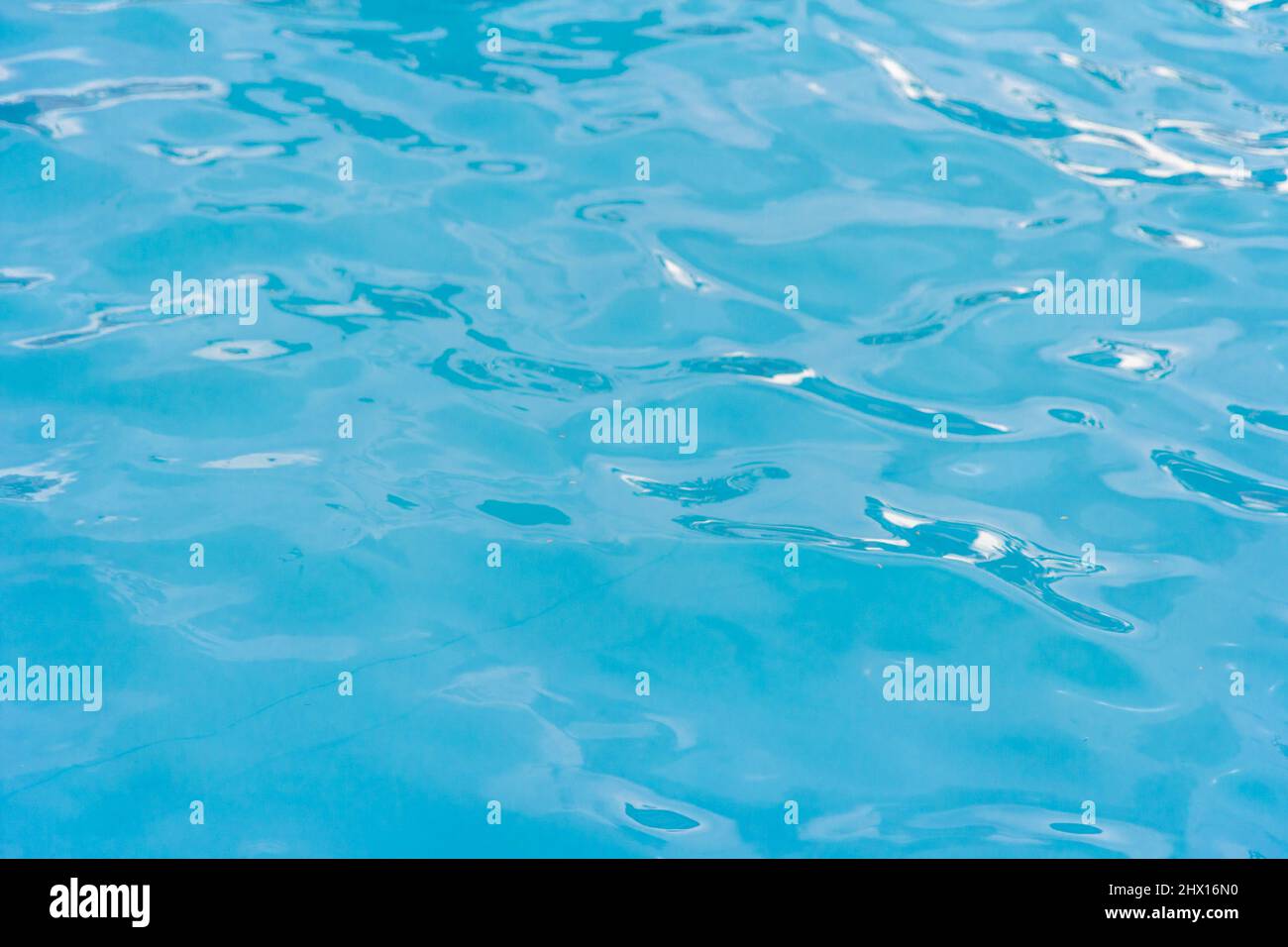 Pool Blue water reflection texture background Stock Photo - Alamy