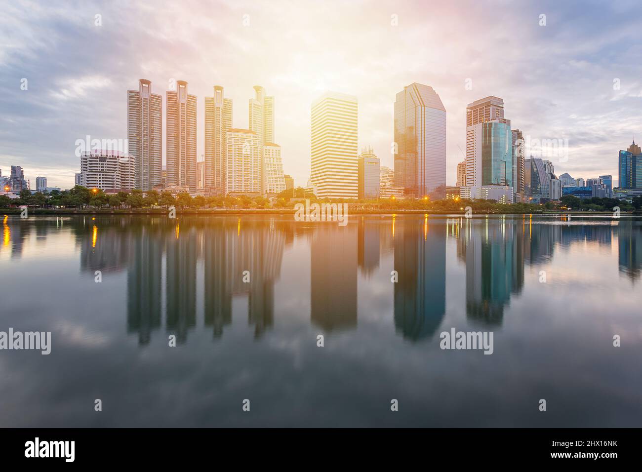 City building with water reflection before sunset background Stock ...