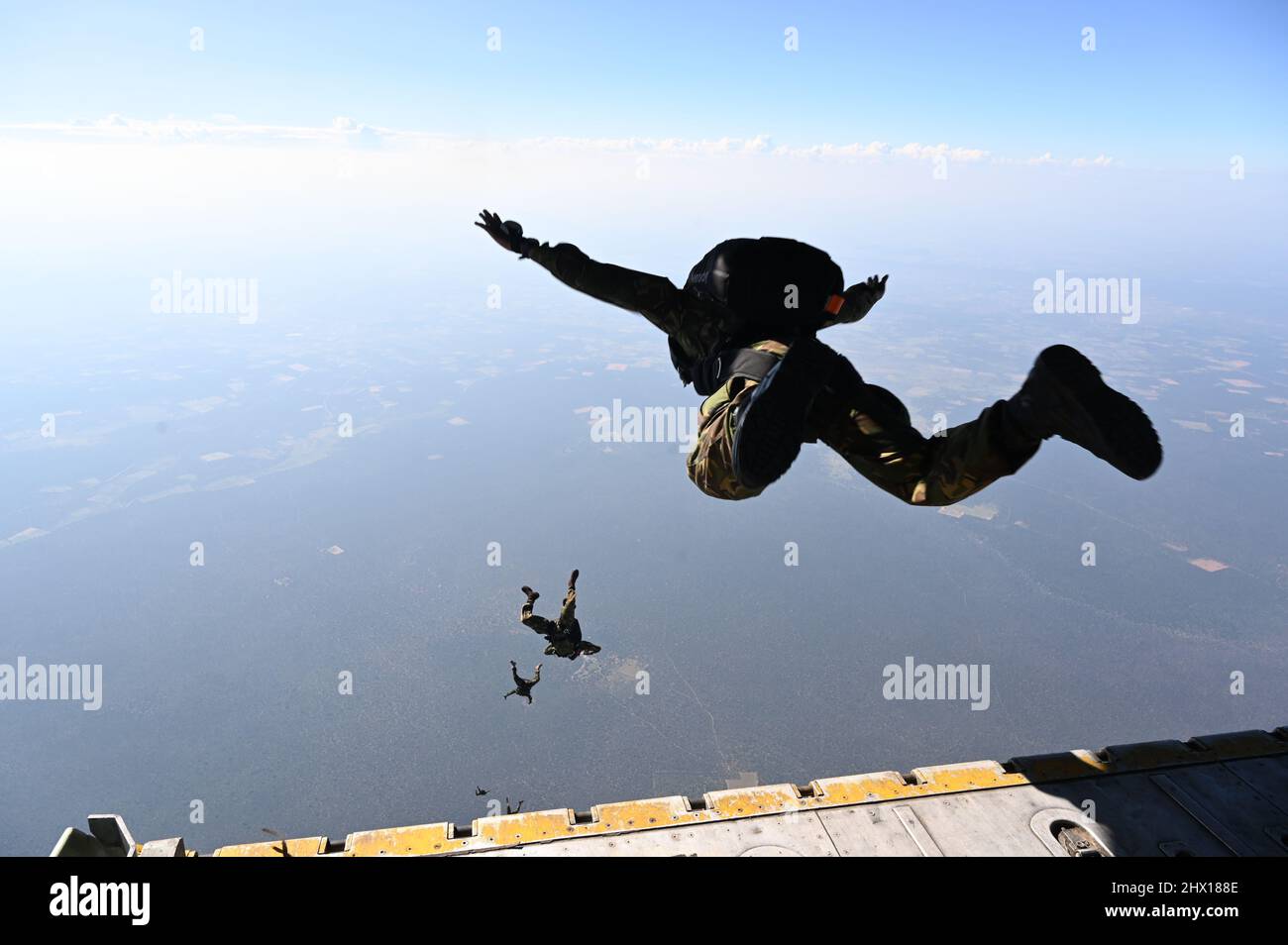Soldiers from the Botswana Defense Force conduct an aerial freefall ...