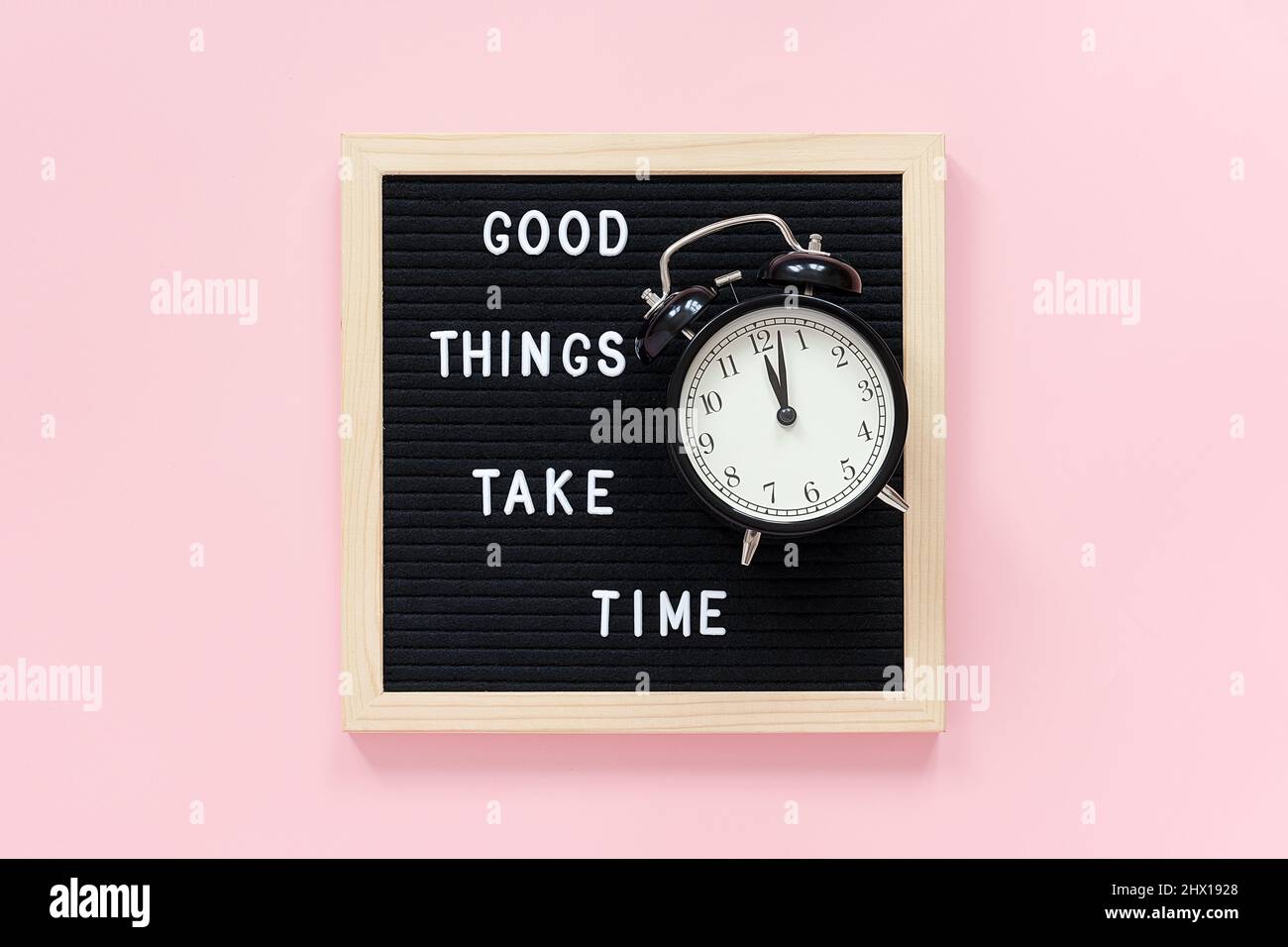 Good things take time. Motivational quote on black letter board, black ...