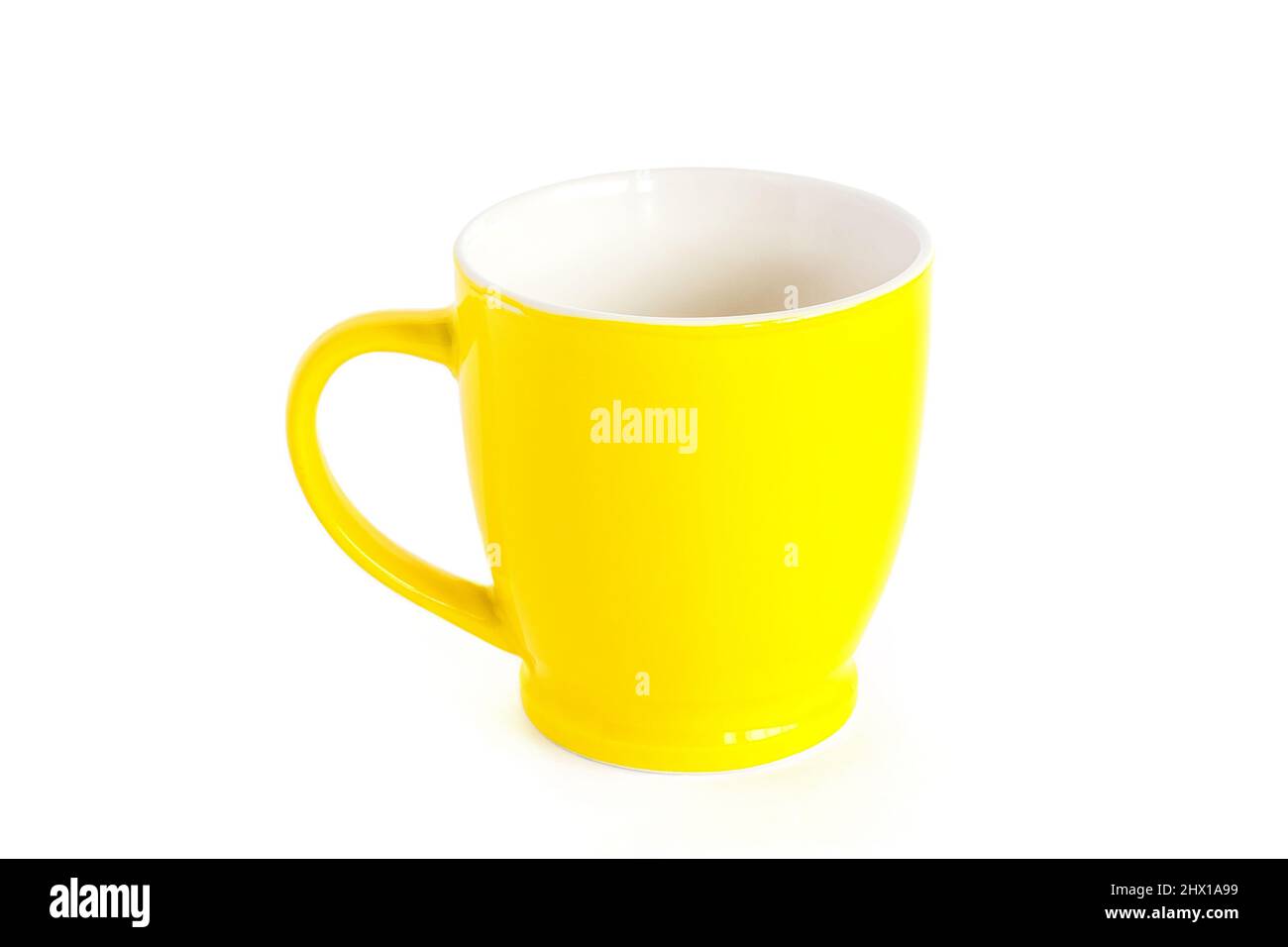 Yellow coffee mug isolated on white background Stock Photo - Alamy