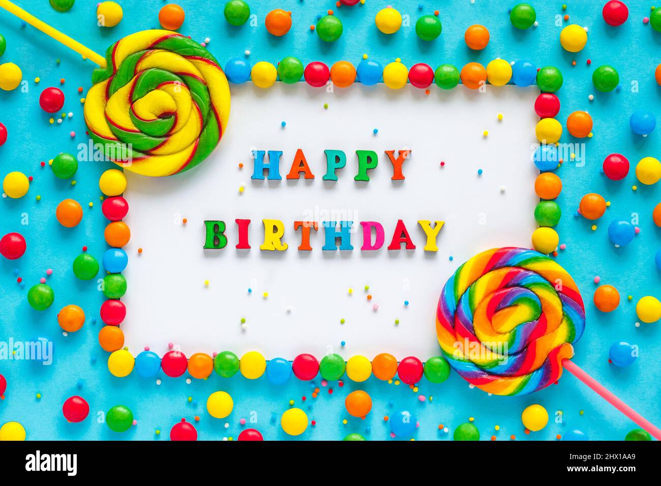 Text HAPPY BIRTHDAY, colored letters, greeting card, candy and ...