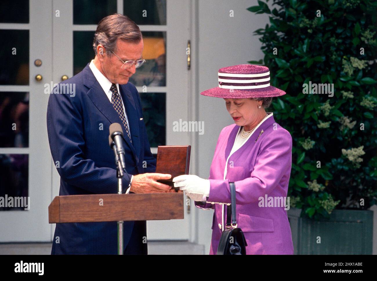 Queen Elizabeth II of Great Britain, right, presents the Churchill ...